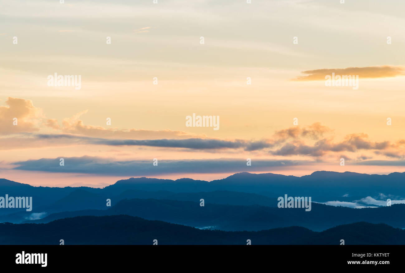 Beautiful Scene of layer mountain in the morning with sunrise scene ...