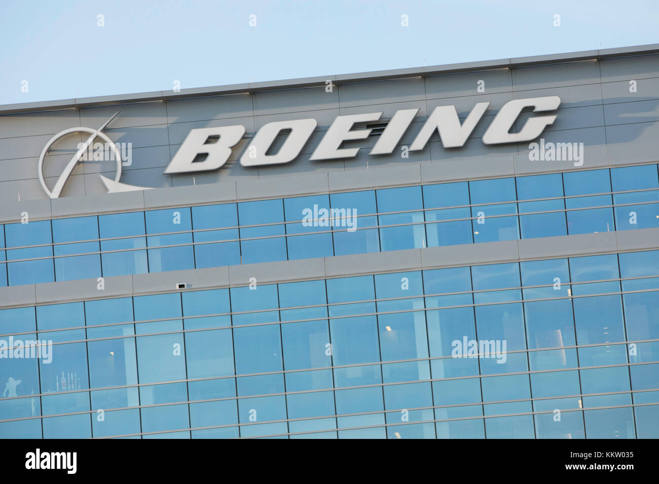 A logo sign outside of a facility occupied by The Boeing Company in ...