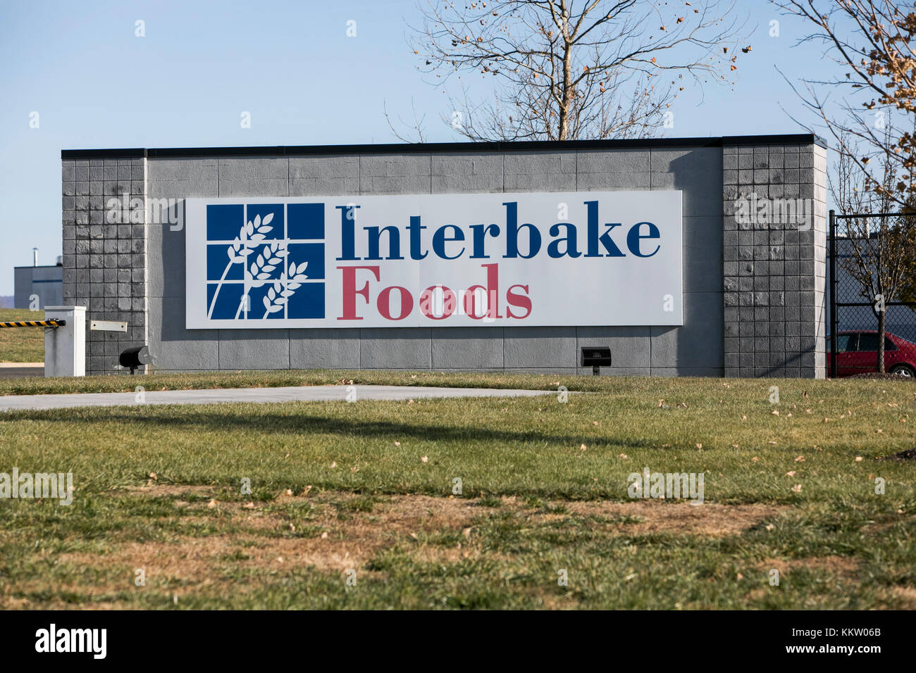 A logo sign outside of a facility occupied by Interbake Foods in Front ...