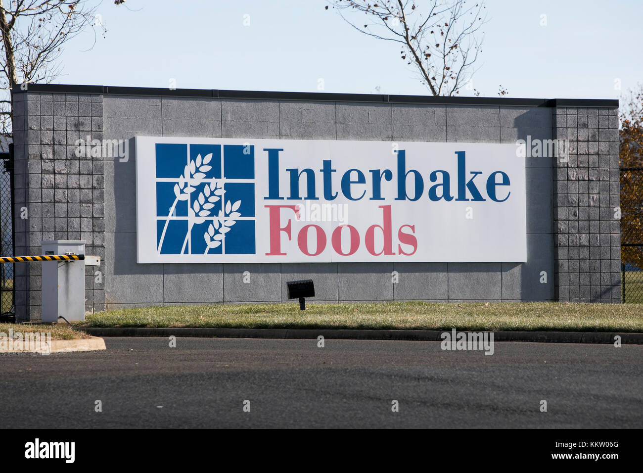 A logo sign outside of a facility occupied by Interbake Foods in Front ...