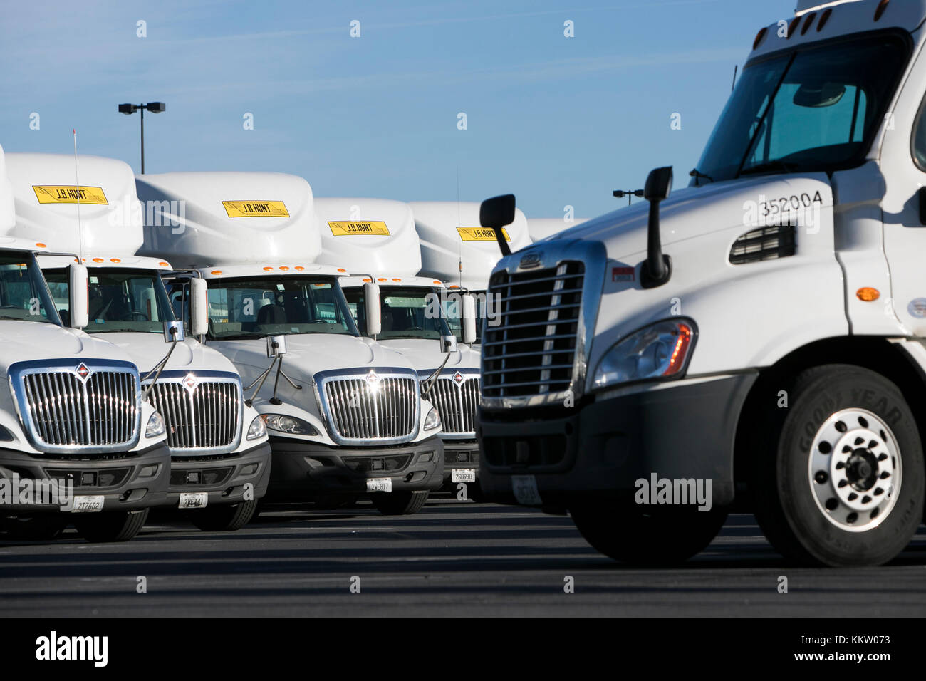 J.B. Hunt Transport Services, Inc., logo signs on semi-trucks in ...