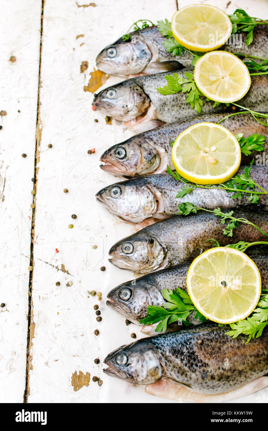 Raw trout fish on the table from above,selective focus and blank space ...
