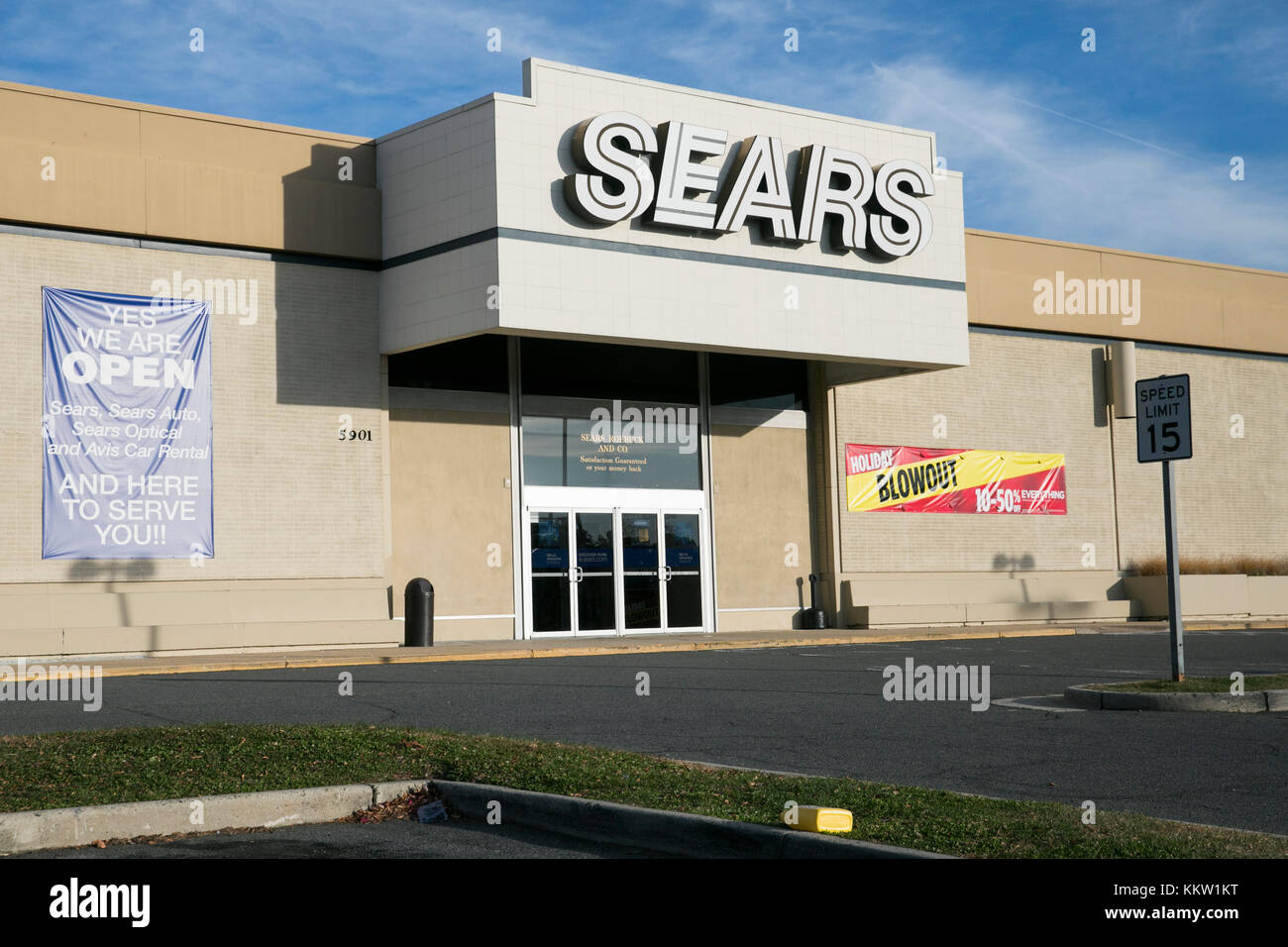 A logo sign outside of a Sears retail store in Alexandria, Virginia on ...