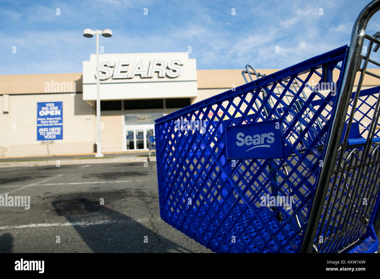 A logo sign outside of a Sears retail store in Alexandria, Virginia on ...