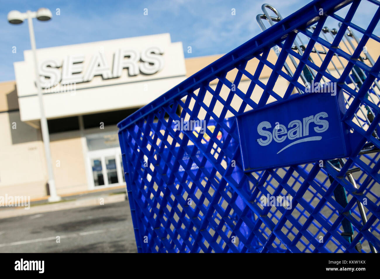 A logo sign outside of a Sears retail store in Alexandria, Virginia on ...