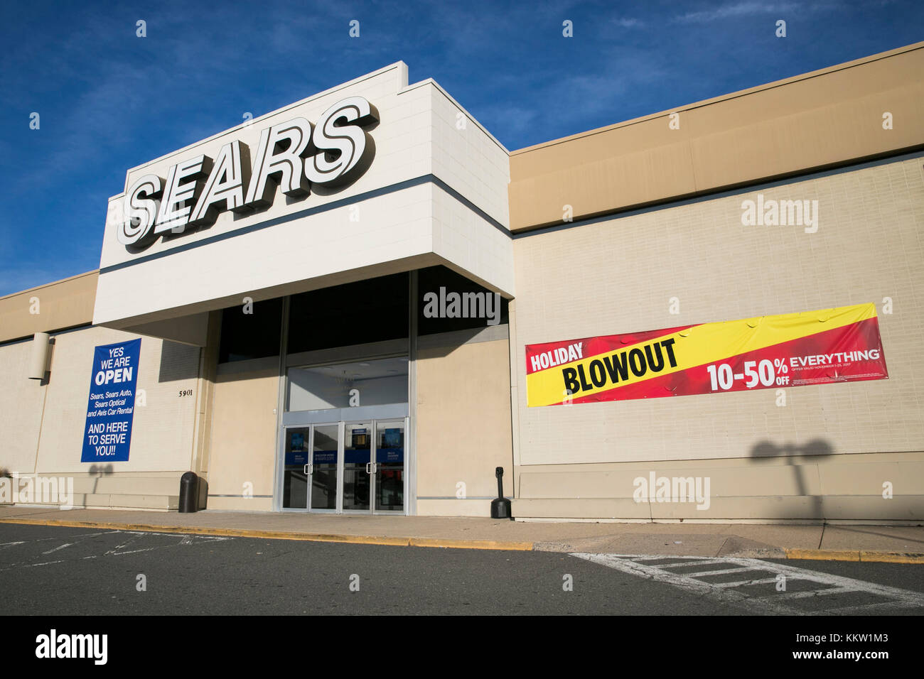 A logo sign outside of a Sears retail store in Alexandria, Virginia on ...