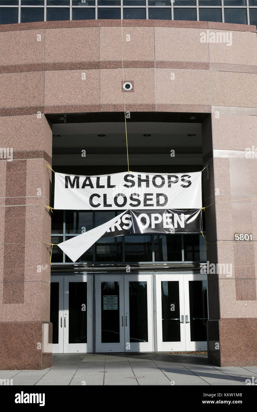 A banner that reads "Mall Shops Closed" outside of the now closed ...