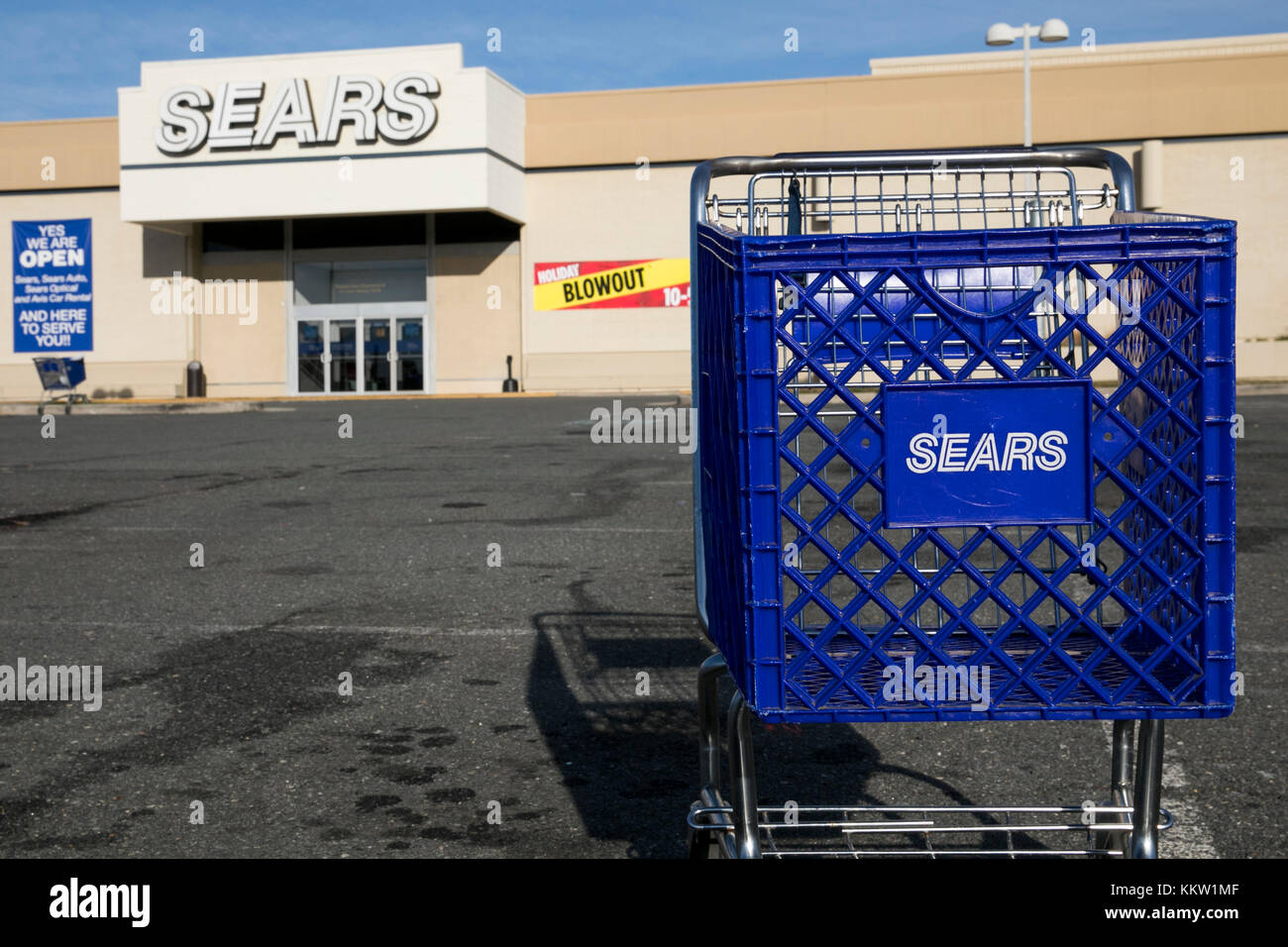 A logo sign outside of a Sears retail store in Alexandria, Virginia on ...