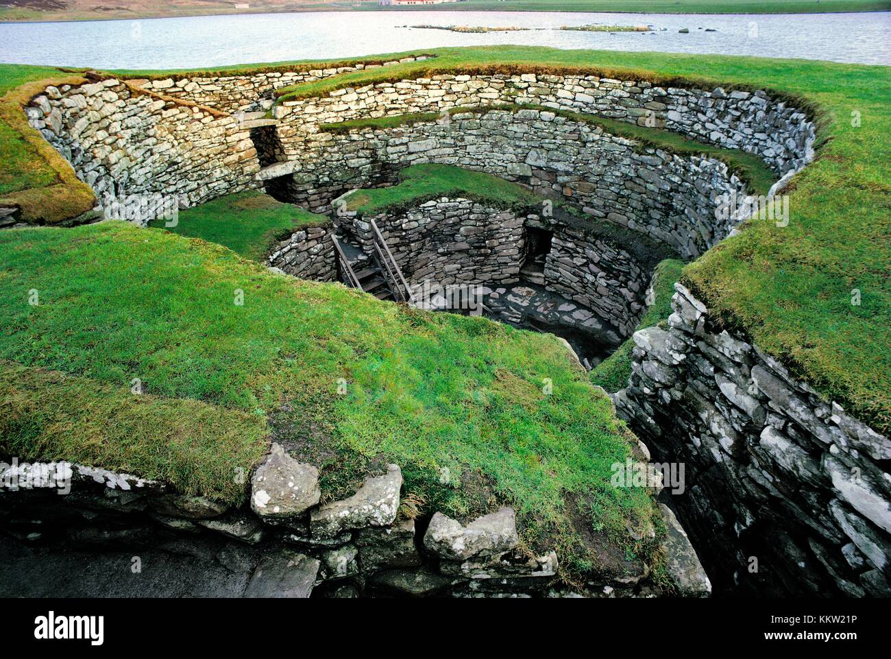Massive walls and interior of Clickhimin prehistoric broch on the edge ...