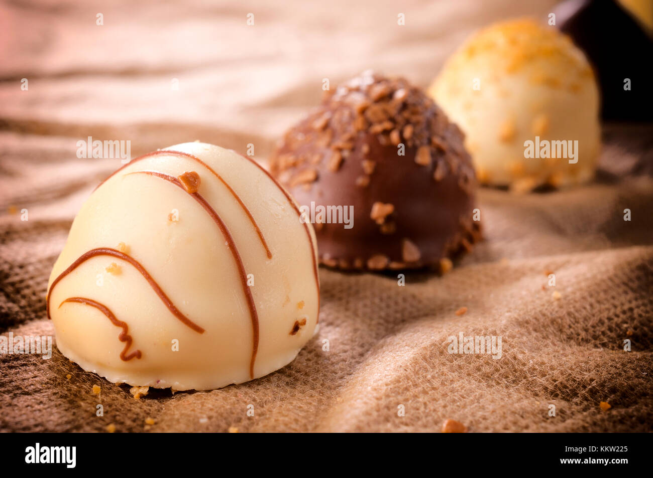 Sweet white chocolate Belgium praline Stock Photo - Alamy