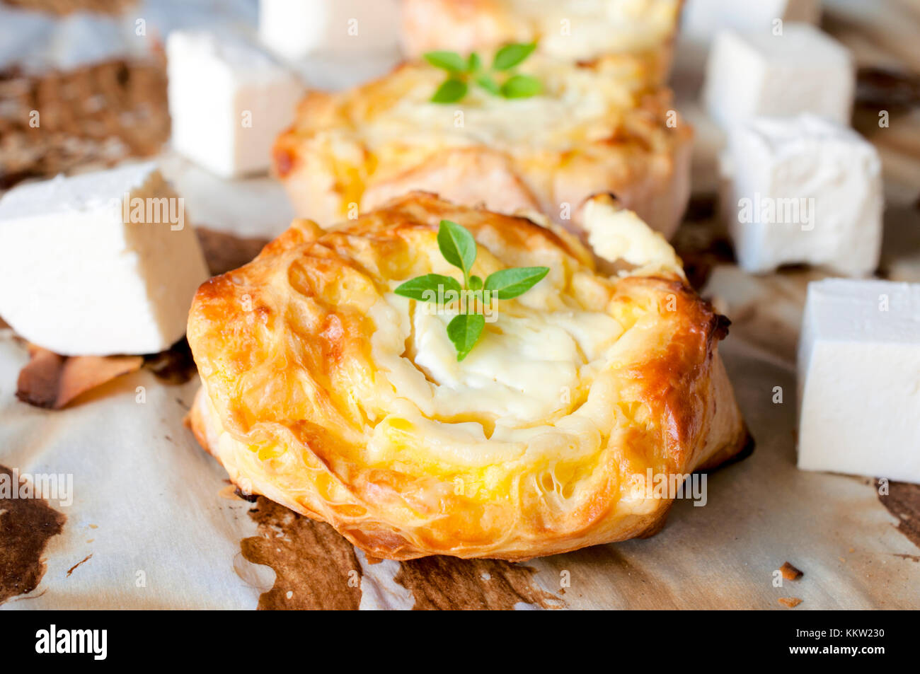 Tasty melted cheese baked pastry Stock Photo - Alamy