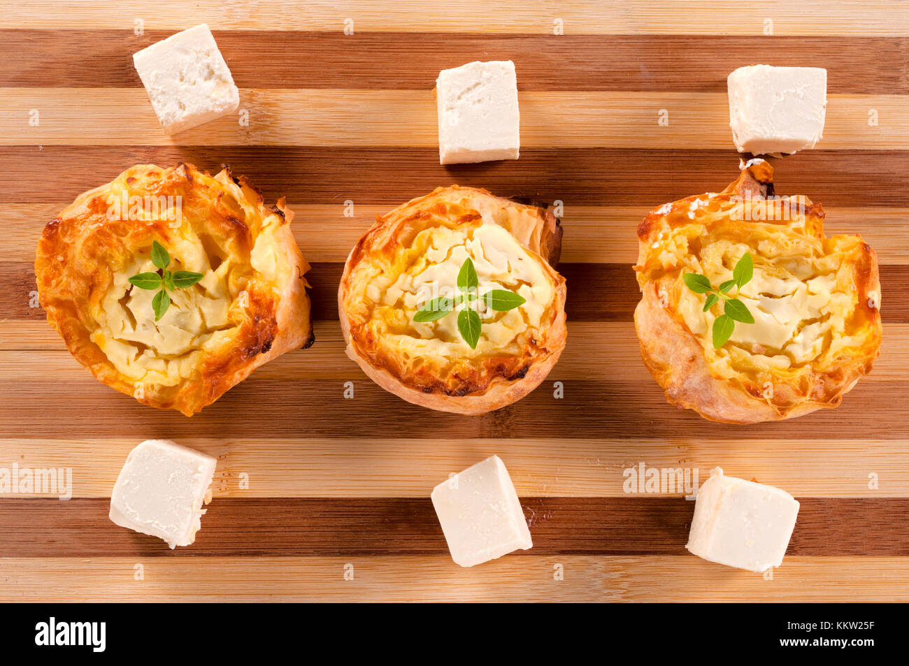 Traditional Serbian pie with melted feta cheese from above on wooden ...