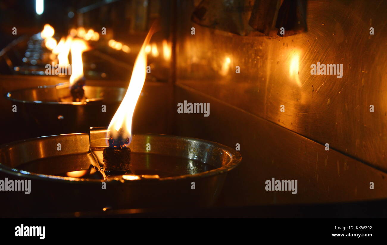 lantern fire worship on oil in night Stock Photo - Alamy