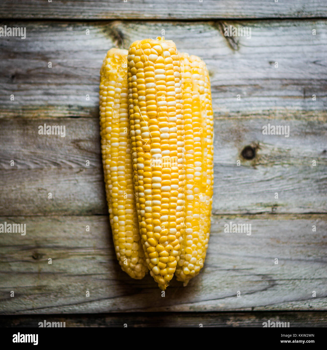 Sweet Corn On Rustic Background Stock Photo - Alamy