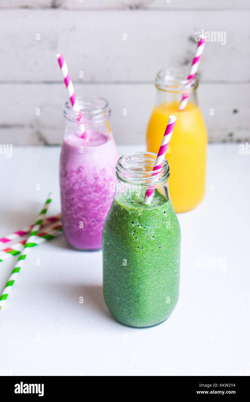 Three Smoothies With Berries Stock Photo - Alamy