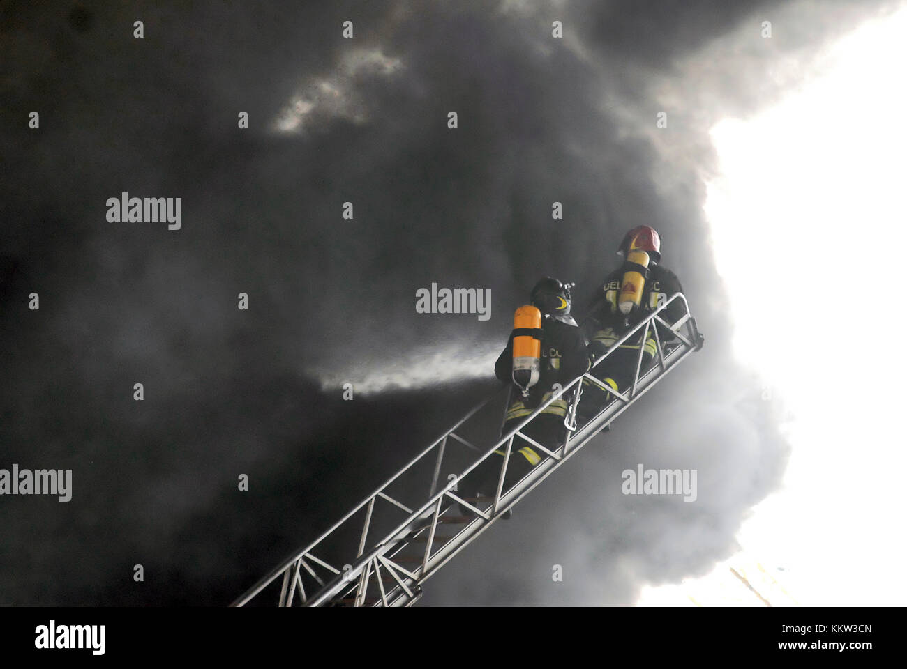 Milan (Italy), the Fire Brigade intervention on a fire Stock Photo - Alamy
