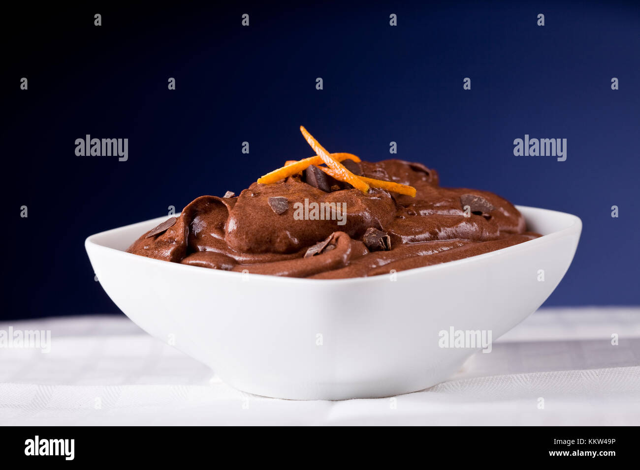 delicious chocolate mousse inside a white bowl with orange zest Stock ...