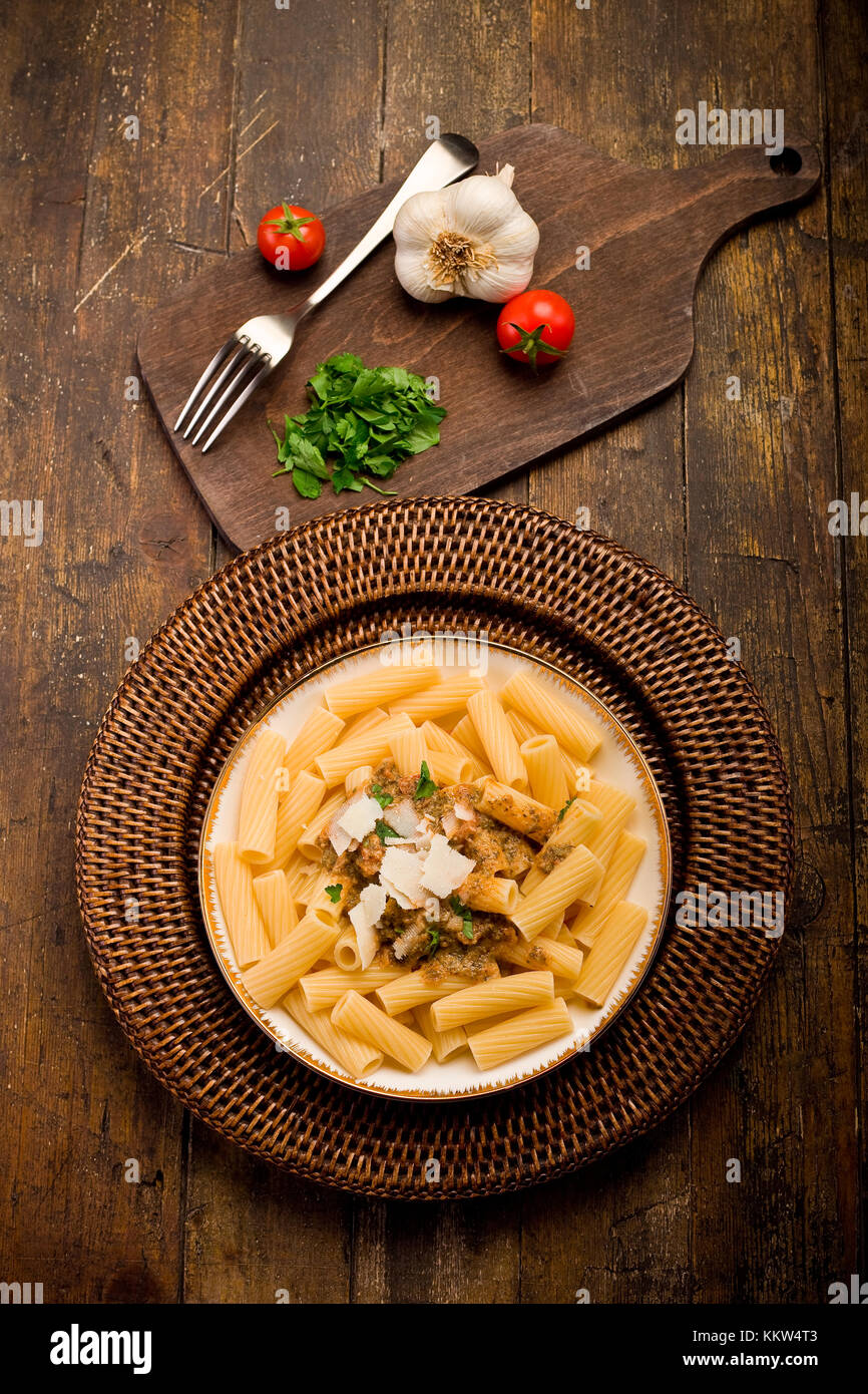delicious macaroni pasta with sicilian pesto on wooden table Stock ...