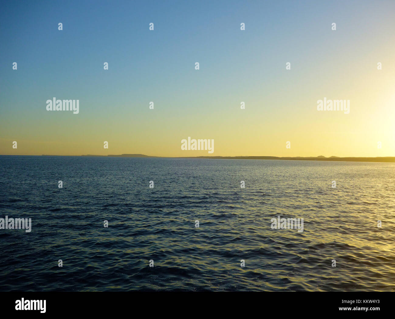 sunset over sea Stock Photo - Alamy