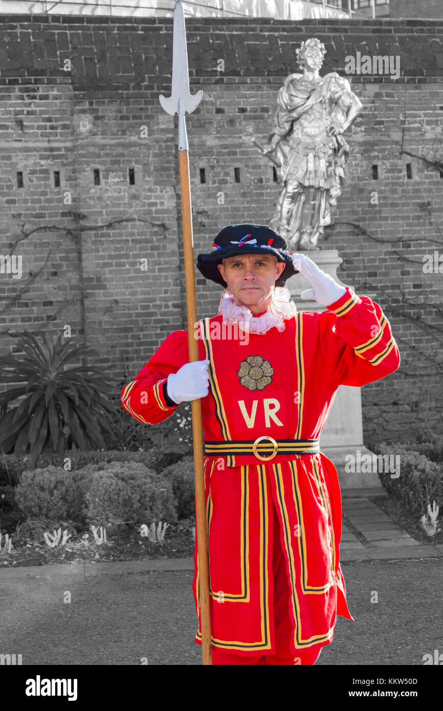 Yeoman of the Guard Beefeater by gilded statue of King William III ...
