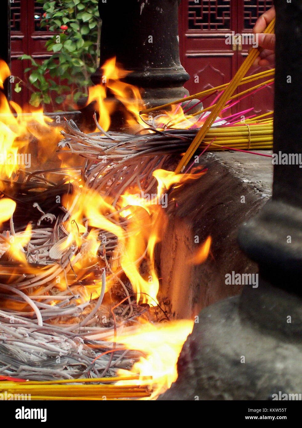 People burn incense and worship at the City God Temple in Shanghai ...