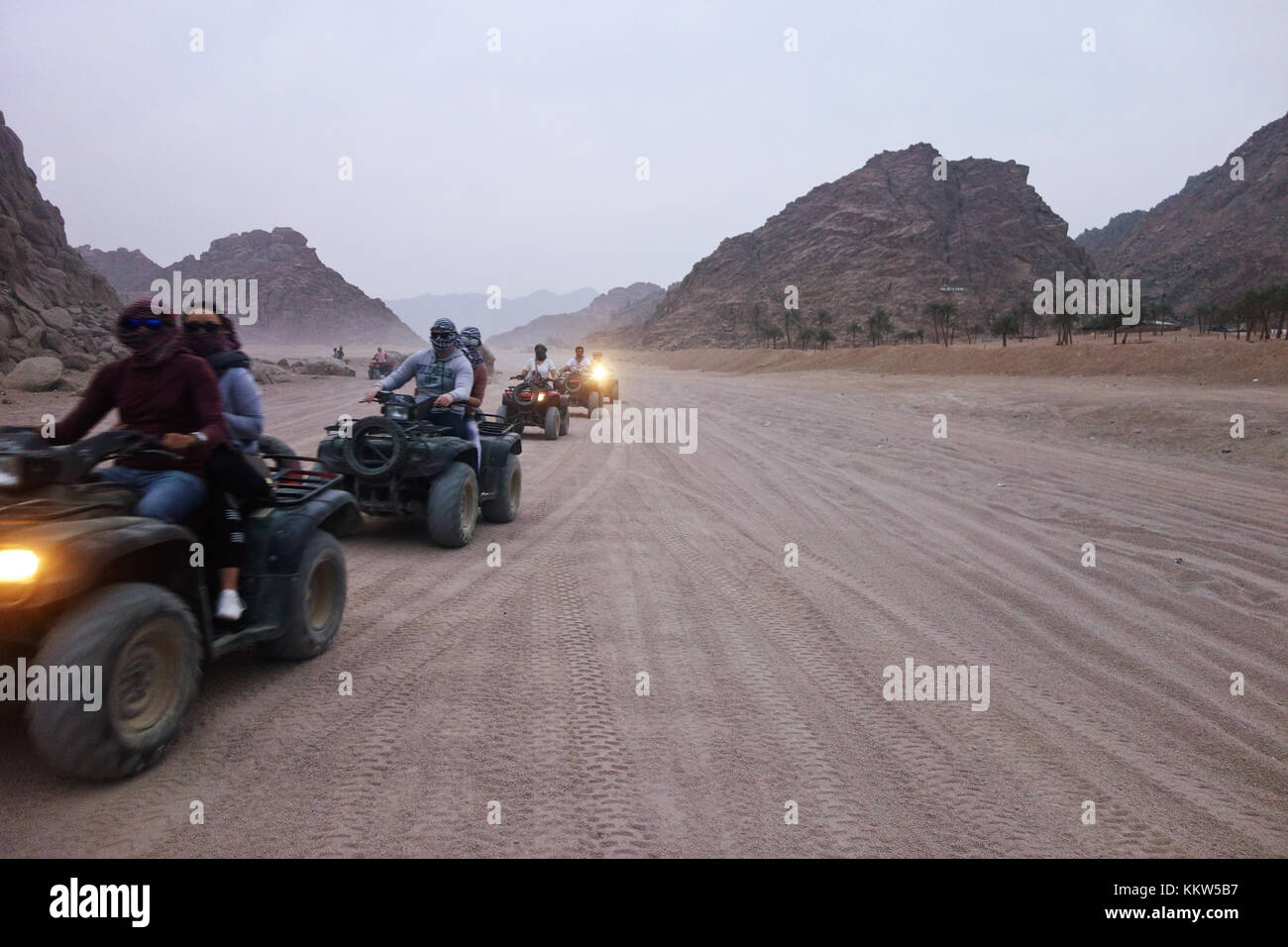 Quad bikes safari in the desert Stock Photo - Alamy