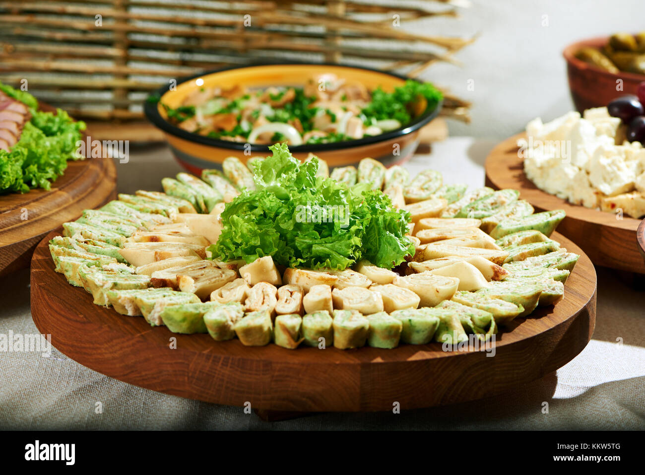 Delicious food on the wooden table Stock Photo - Alamy