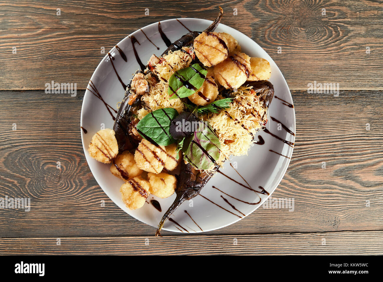 Delicious food on the wooden table Stock Photo - Alamy