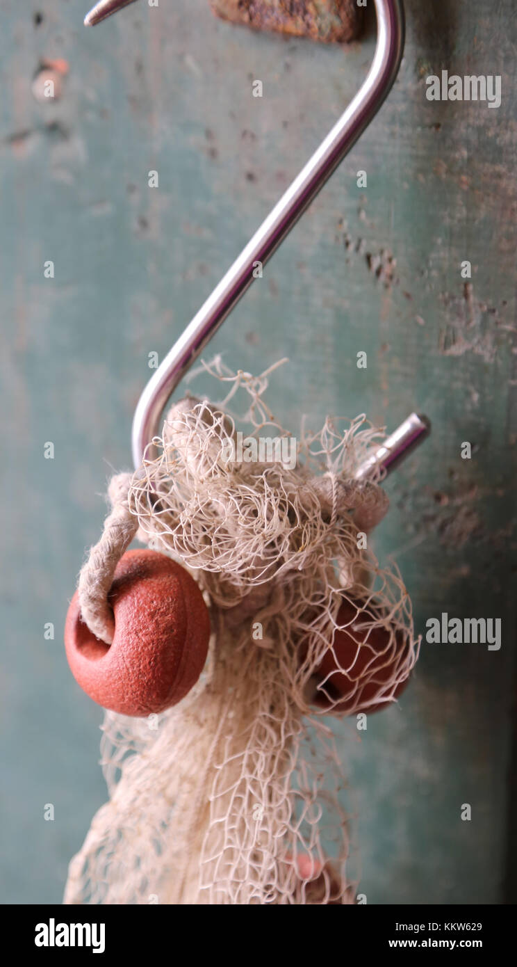 detail of a fishing boat with big hook and float with fishing net Stock ...