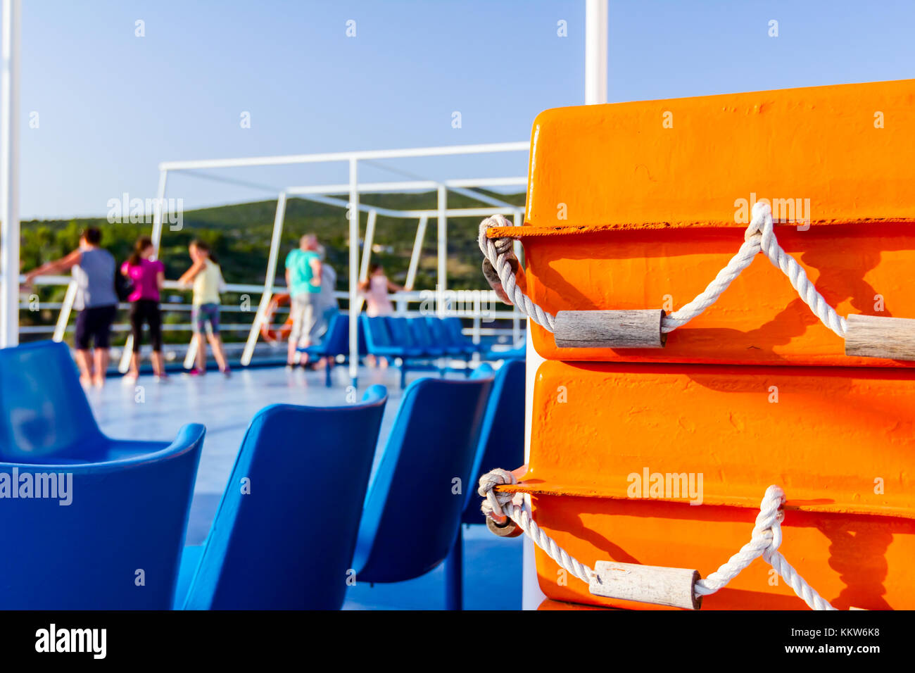 Rescue equipment on a ship's deck, stack of life rafts with ropes for ...