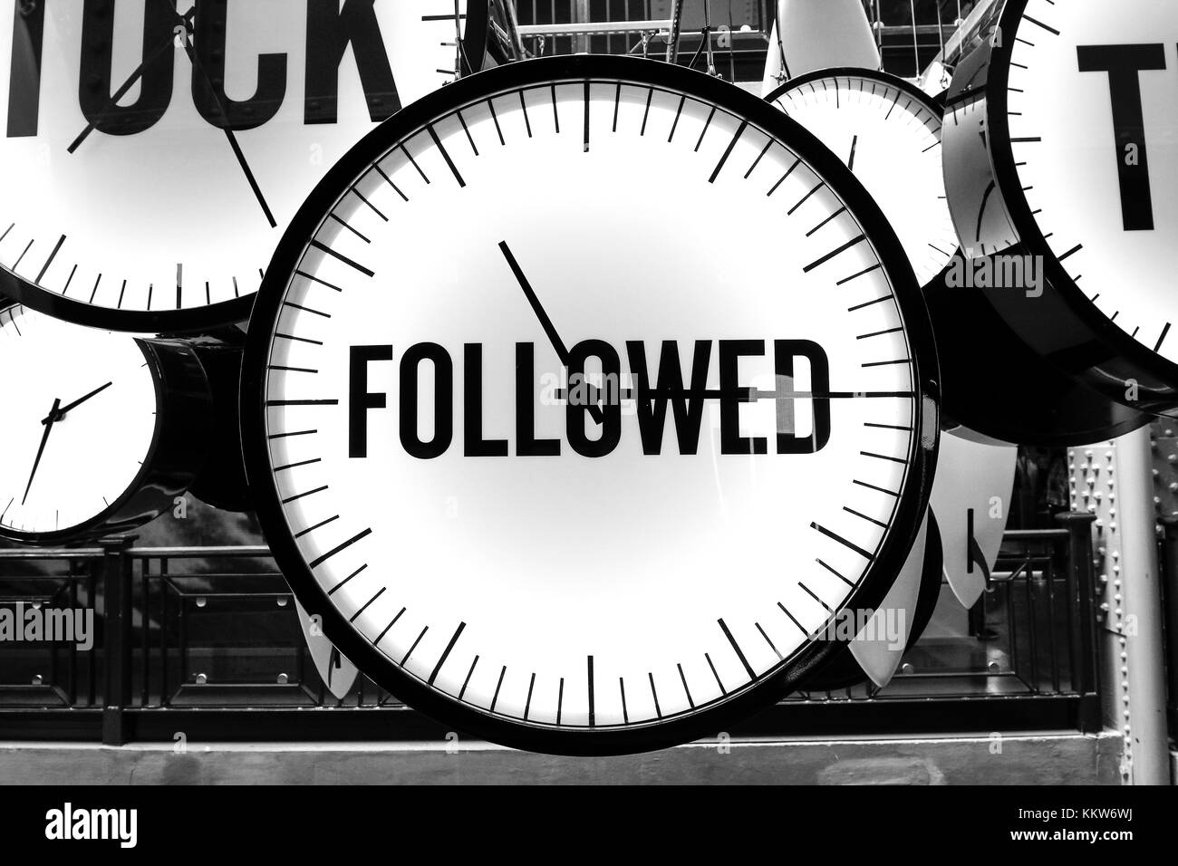 black and white photos with a large clock with the inscription ...