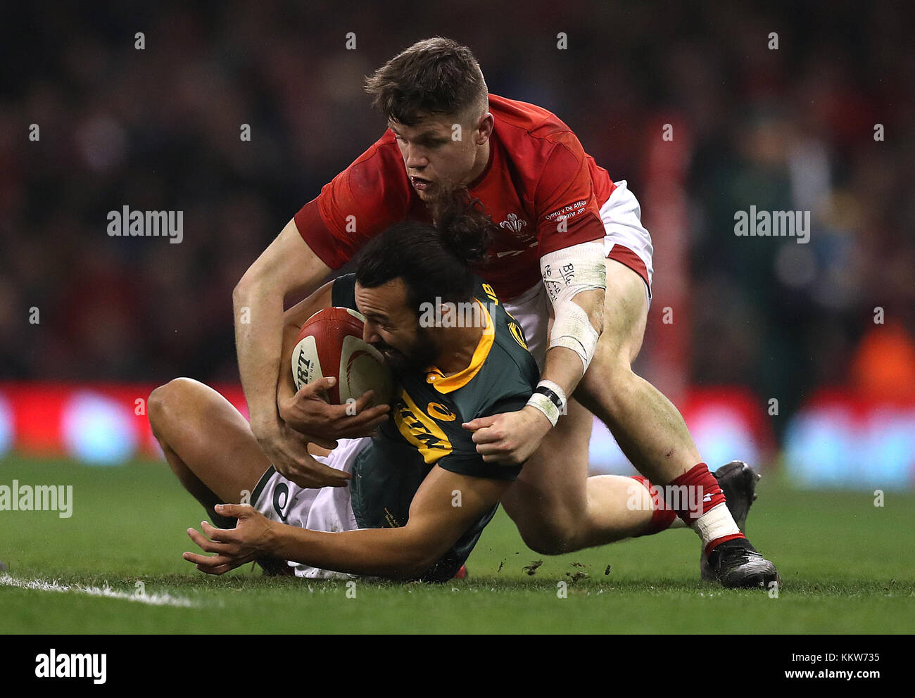 South Africa's Dillyn Leyds is tackled by Wales' Steff Evans during the ...