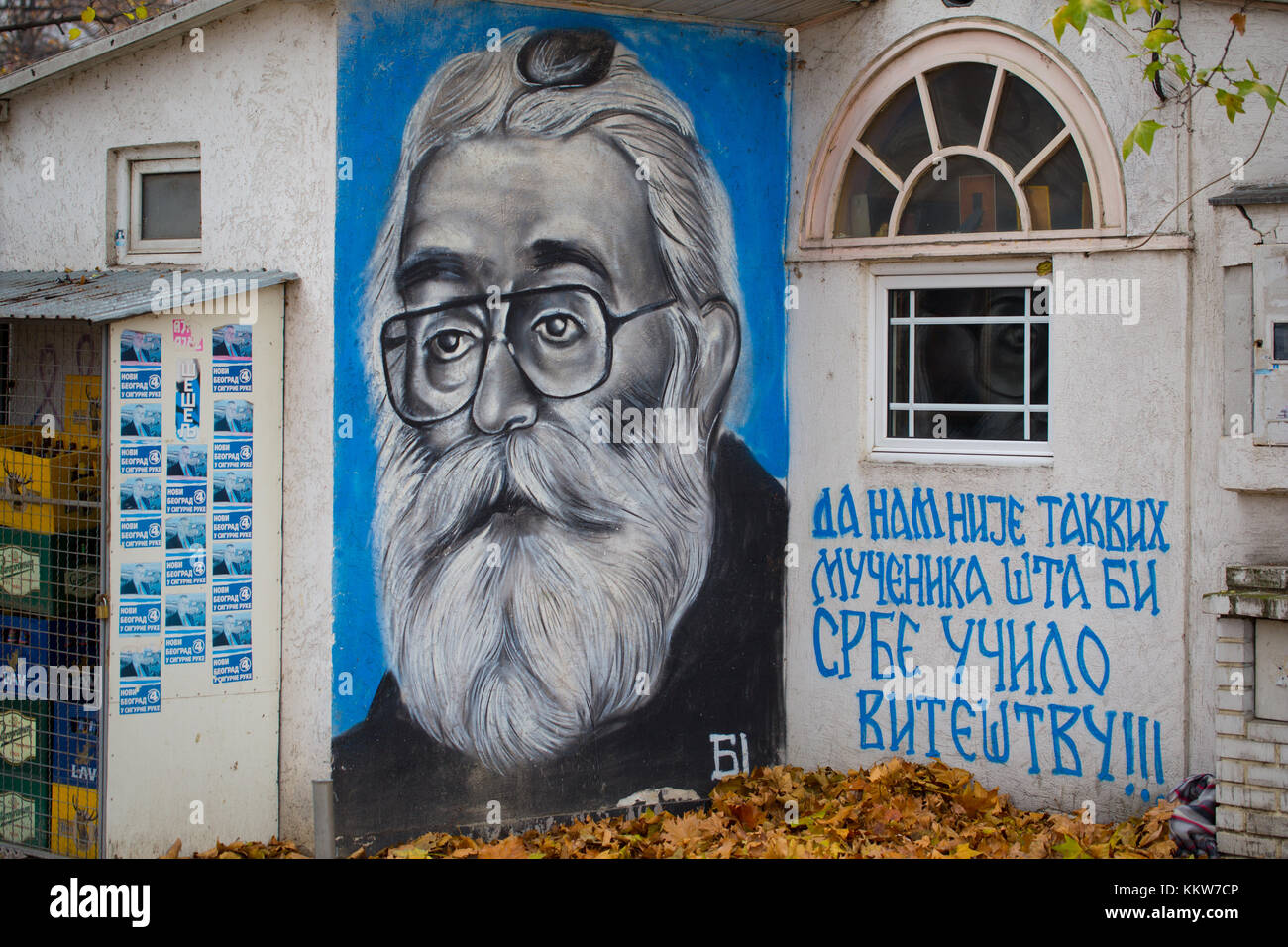 Portrait graffiti of Radovan Karadzic alias Dragan Dabic at a wall of a ...