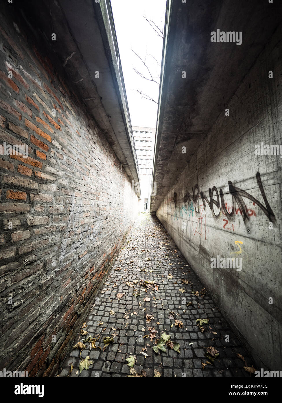 Walking between two walls Stock Photo - Alamy
