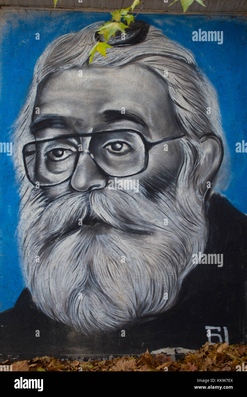 Portrait graffiti of Radovan Karadzic alias Dragan Dabic at a wall of a ...