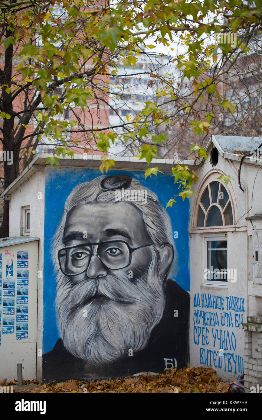 Portrait graffiti of Radovan Karadzic alias Dragan Dabic at a wall of a ...