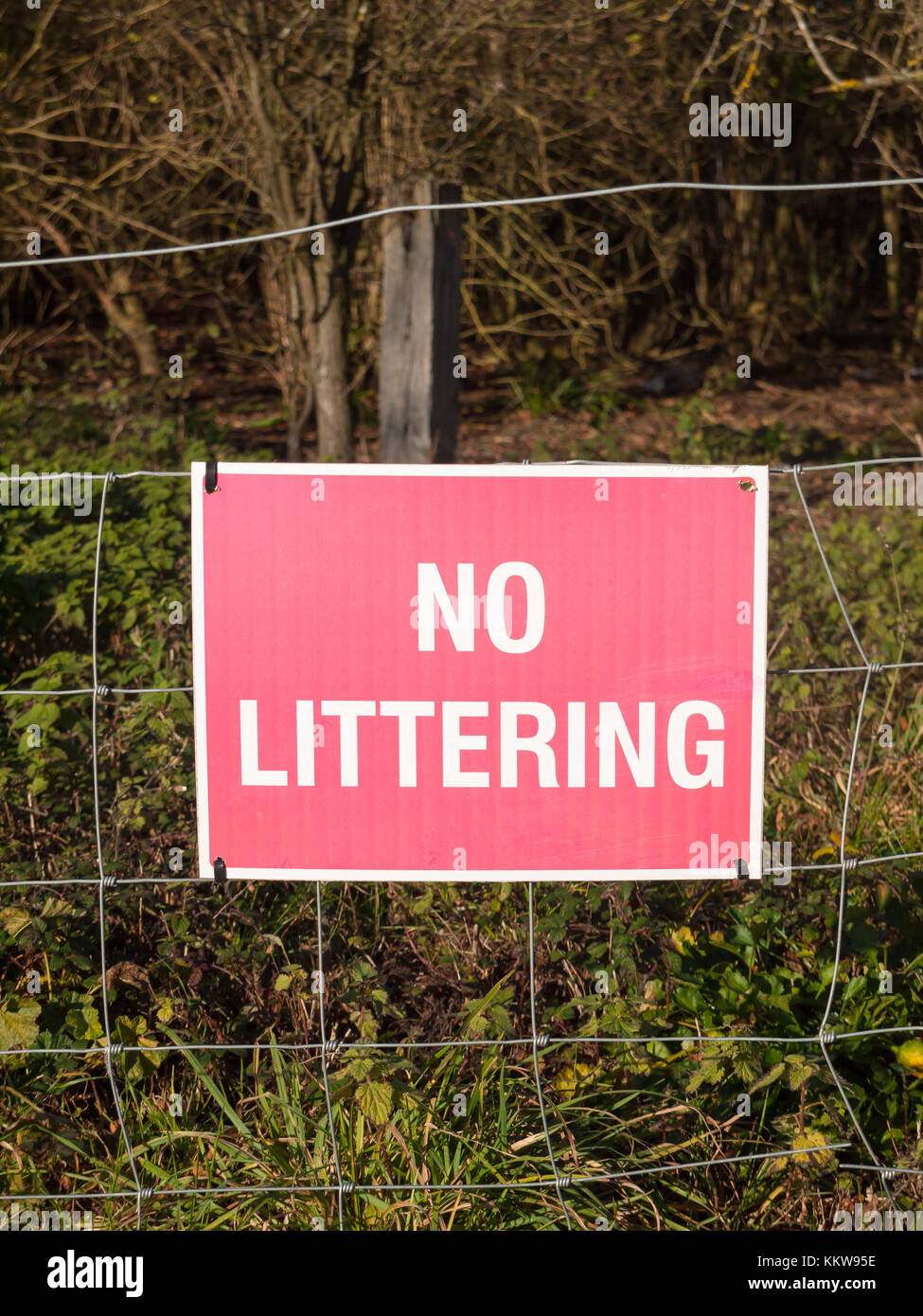 close up of red and white country sign no littering; essex; england; uk ...