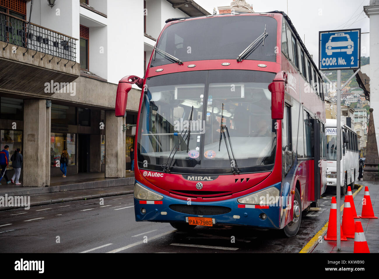 QUITO, ECUADOR NOVEMBER, 28, 2017: Beautiful red tour bus at historical ...