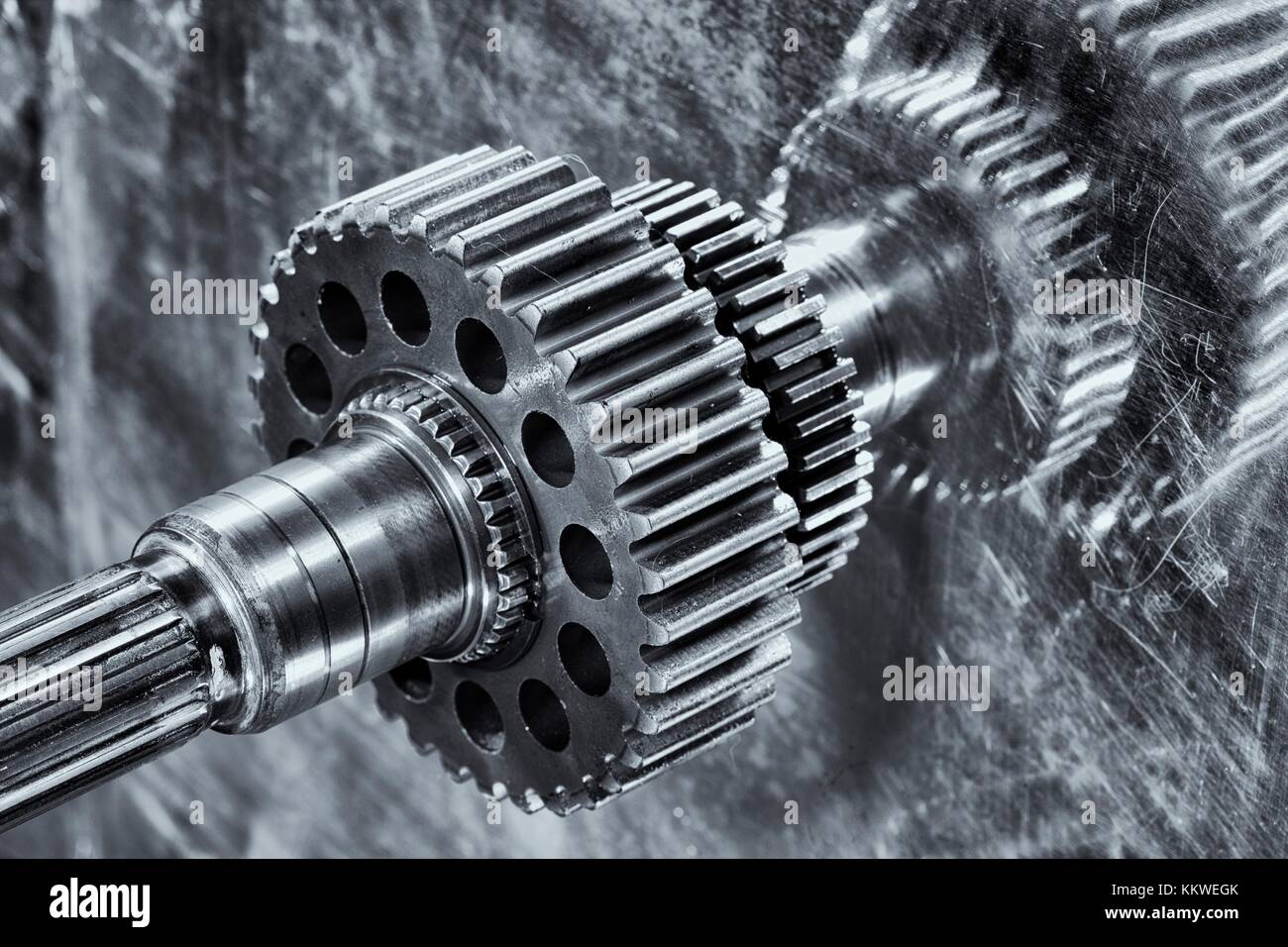 Titanium gears mirrored in brushed aluminum Stock Photo - Alamy