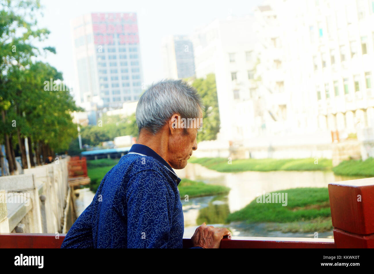 An 80-year-old Chinese man, playing outdoors Stock Photo - Alamy