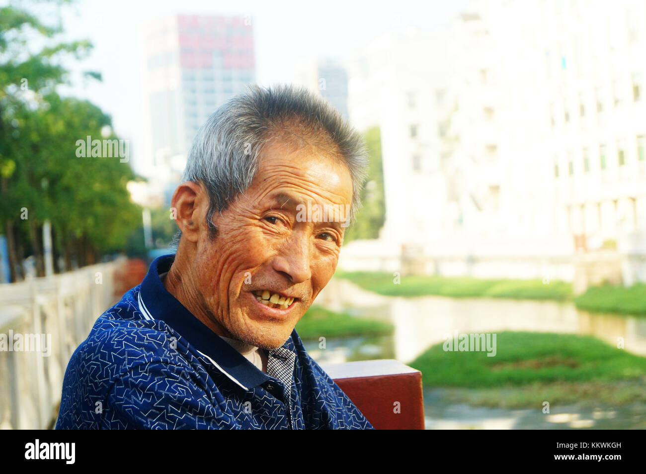 An 80-year-old Chinese man, playing outdoors Stock Photo - Alamy