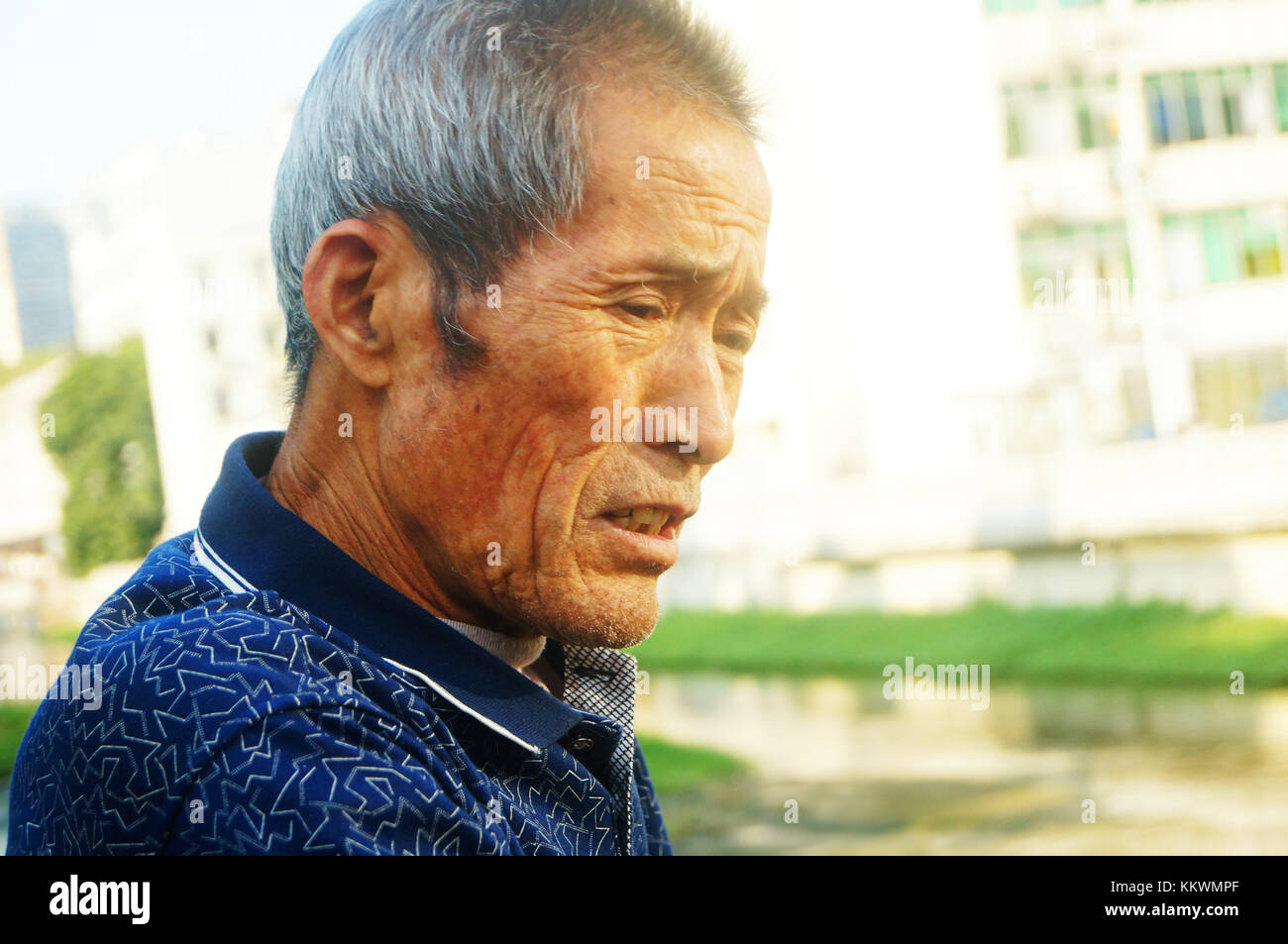 An 80-year-old Chinese man, playing outdoors Stock Photo - Alamy