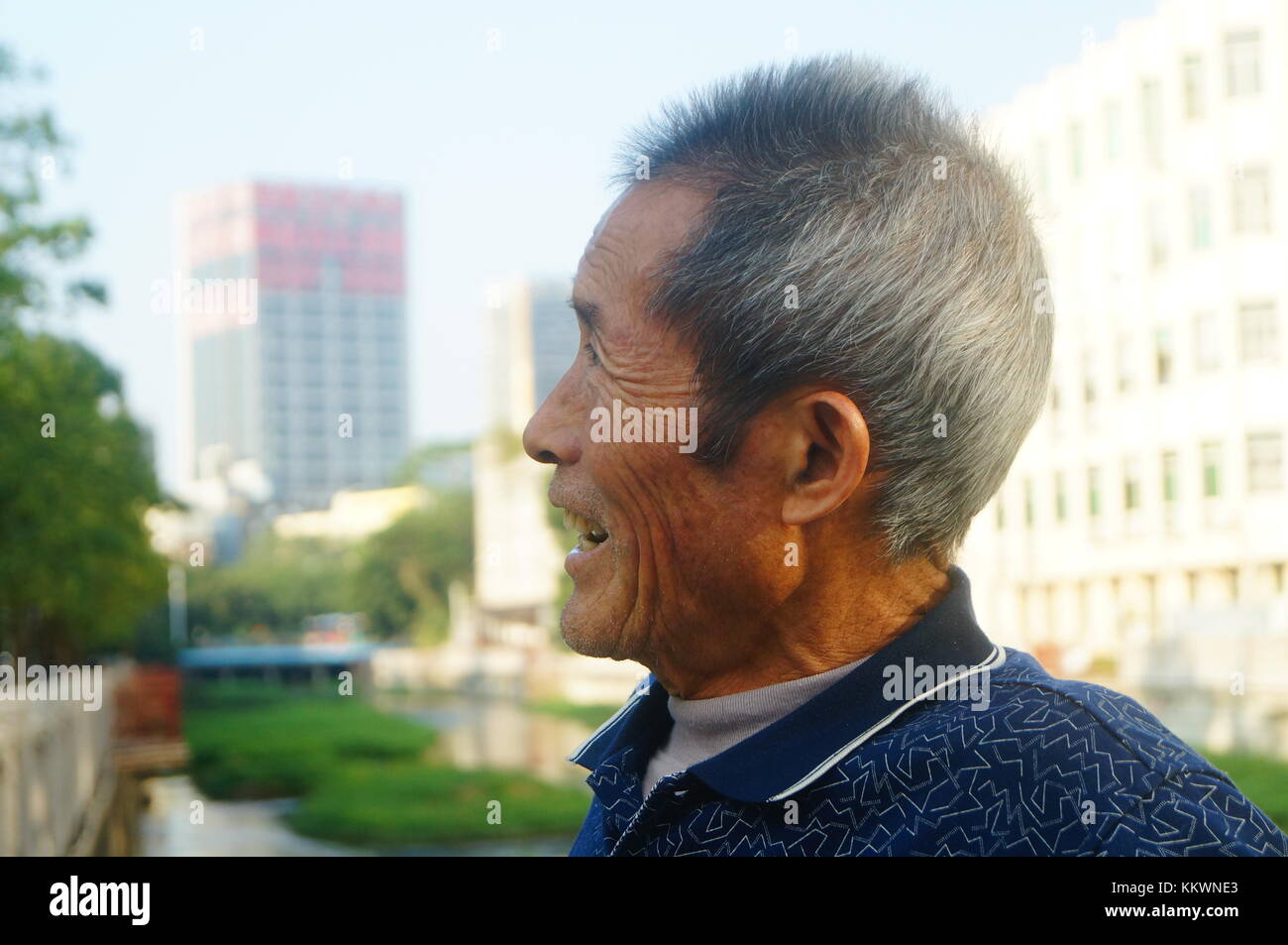 An 80-year-old Chinese man, playing outdoors Stock Photo - Alamy