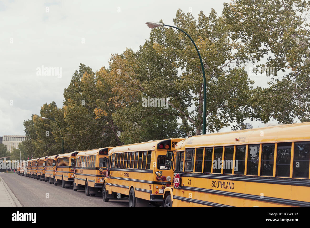 School buses lined up outside sporting event. Calgary Alberta Canada ...