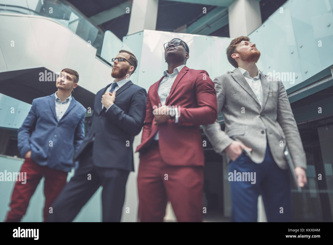 Multi-Cultural Office Staff Standing In Lobby. professional business ...