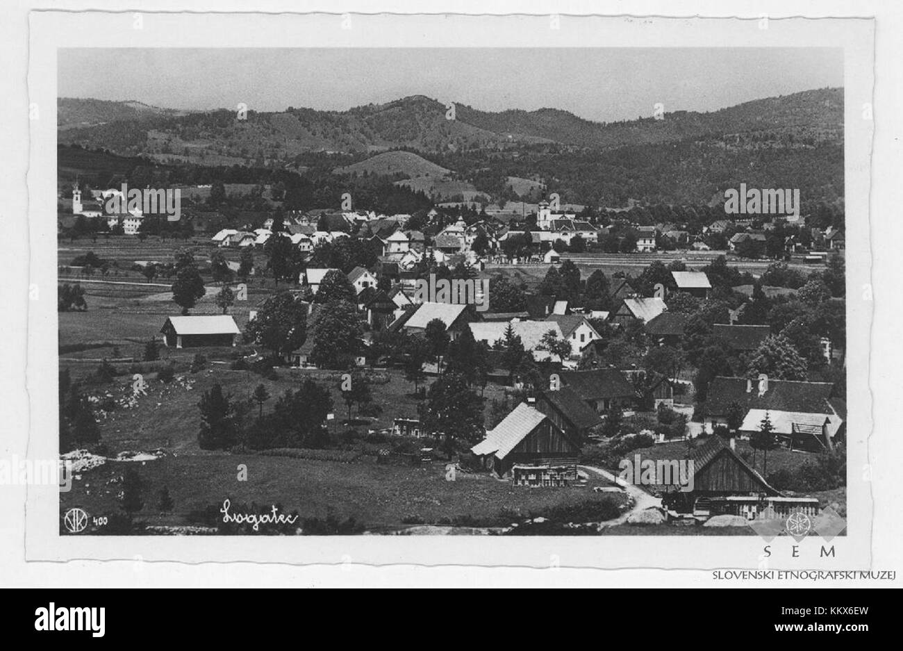 A vintage postcard of Logatec, a town in Slovenia, capturing the region ...