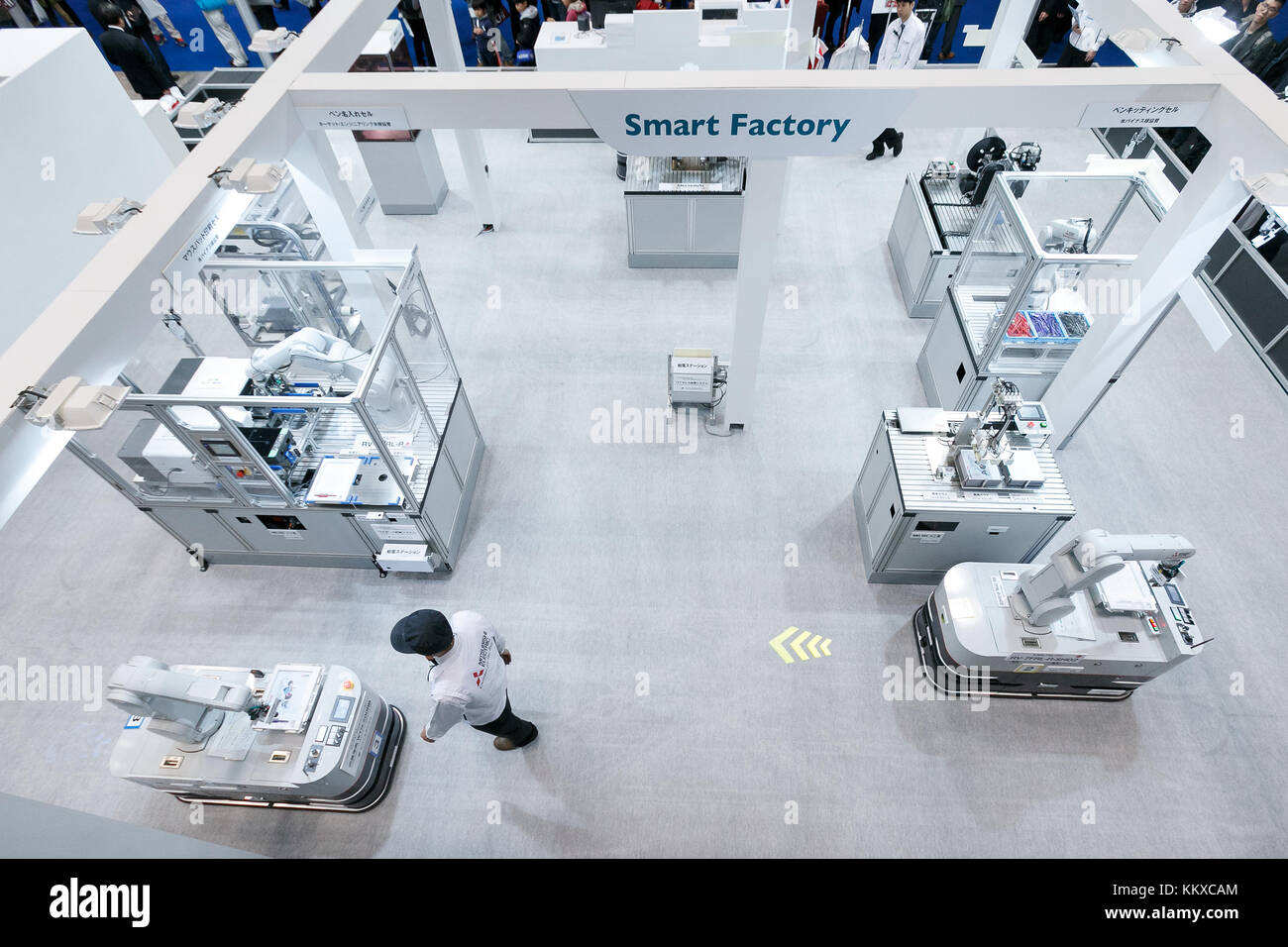 Robots working are seen at Mitsubishi Smart Factory during ...