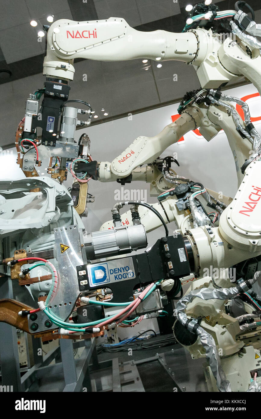 NACHI's industrial robots perform during International Robot Exhibition ...