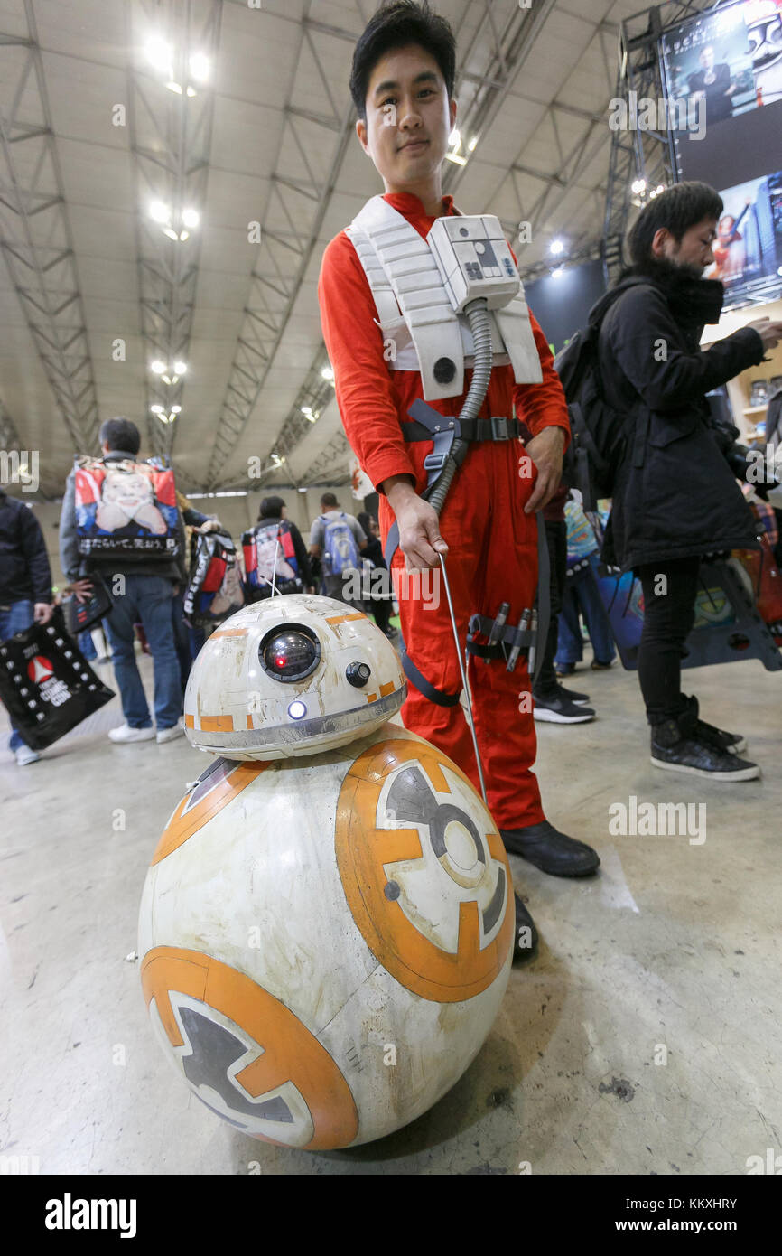 A cosplayer poses for a photograph during the Tokyo Comic Con 2017 at ...