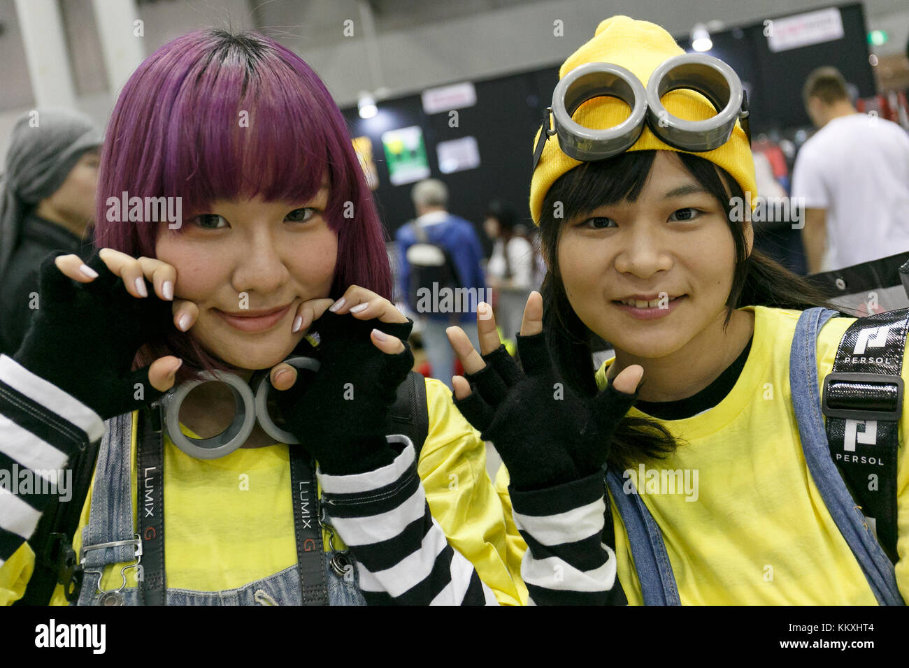 Cosplayers pose for a photograph during the Tokyo Comic Con 2017 at ...